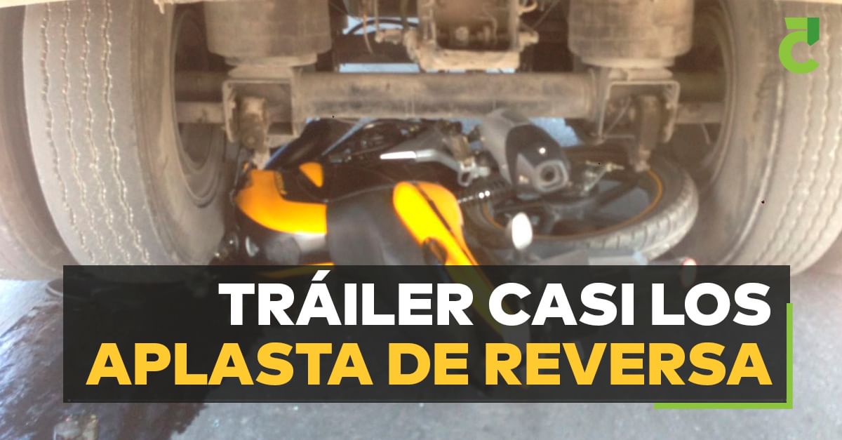 Tráiler casi los aplasta de reversa